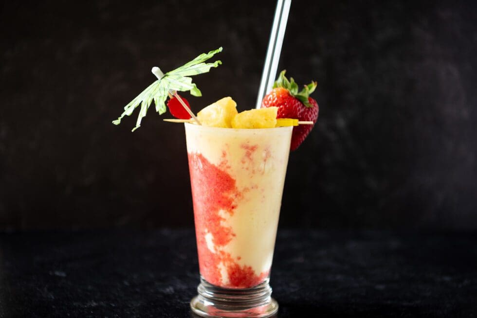 Delicious Strawberry Lava Flow Pina Colada Mocktail - Delectable Food Life